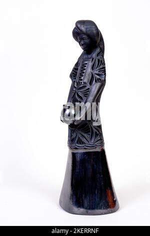 A Oaxacan black pottery figure of an indigenous Yalalag Zapotec woman ...