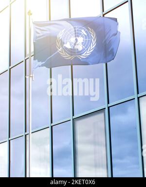 National flag of UN on a flagpole Stock Photo - Alamy