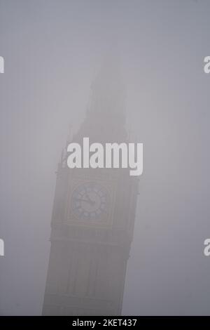 Big Ben clock tower shrouded in thick fog, London, England Stock Photo ...