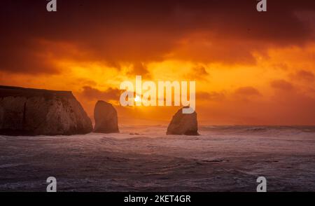 Stormy November sunrise at Freshwater Bay and Stag rock Isle of Wight ...