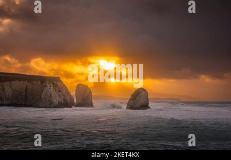 Stormy November sunrise at Freshwater Bay and Stag rock Isle of Wight ...