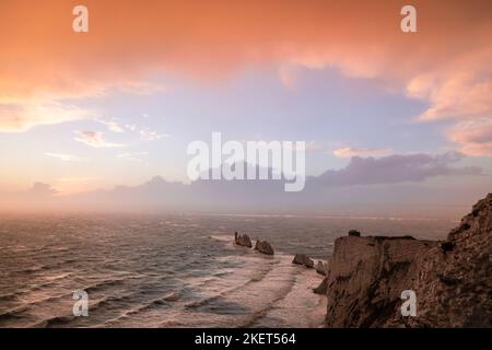 Stormy sunset at The Needles viewpoint Isle of Wight south east England ...