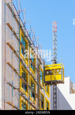 Construction elevator cabin for lifting workers Stock Photo - Alamy