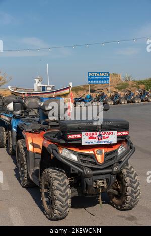 Crete, Greece,Europe. @2022. Twin seat quad bikes and passengers take a ...
