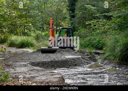 Dredging the Lyde Brook in Loamhole Dingle, Coalbrookdale Stock Photo ...