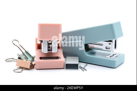 Office staplers, staples and paper clips on white background Stock ...