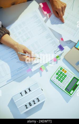 tax time. accountant woman with documents and laptop working Stock ...