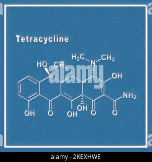 Tetracycline antibiotic, Structural chemical formula on a blue ...