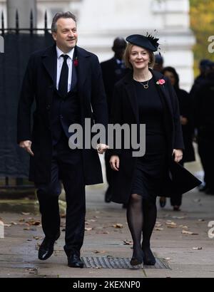 Hugh O’Leary and Liz Truss walk through Downing Street to attend the ...