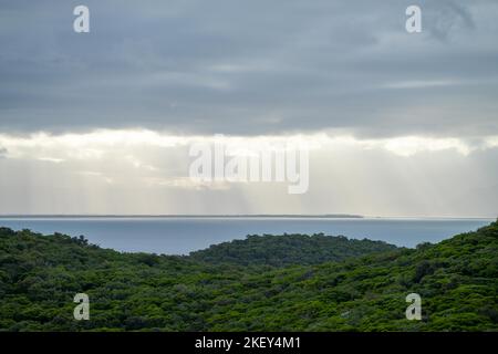 yatching in queenland australia. at a tropical island coastline in ...