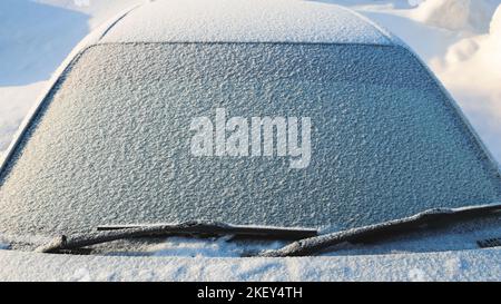 Snow covered car windshield close-up. Winter. Season specific. Outdoors ...