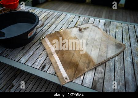 compost tea bag on a regenerative organic farm in australia Stock Photo ...