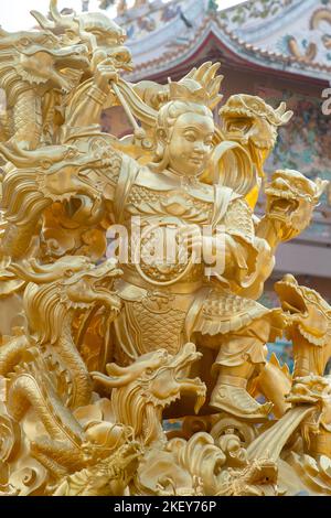 Golden Naja statue in Wihan Thep Sathit Phra Ki Ti Chaloem temple or ...