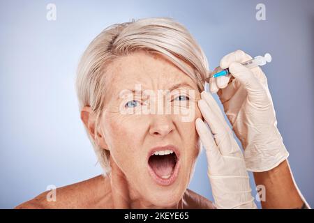 Elderly woman getting Botox injection procedure Stock Photo - Alamy