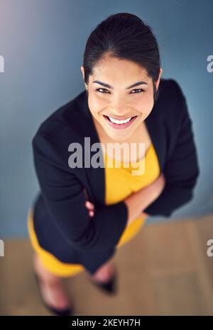 Confidence is the key to success. Studio portrait of an attractive ...