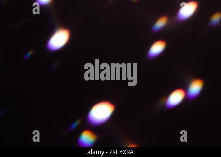 colorful rainbow crystal light leaks on black background Stock Photo ...