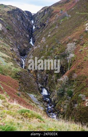 View to waterfalls on Afon Cwm Llan river below Y Lliwedd in mountains ...