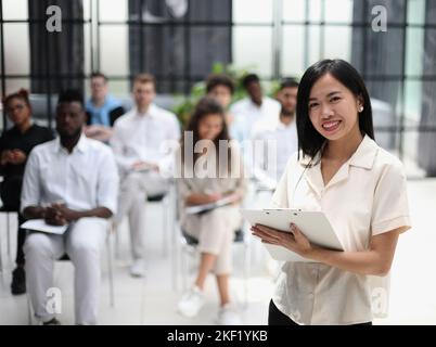 Selective focus of lecturer talking to audience during seminar in ...
