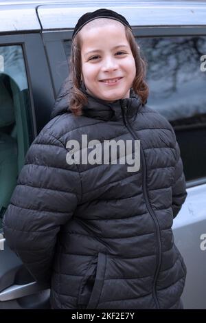 Posed portrait of a teenage Hasidic Jewish boy on Lee avenue in ...