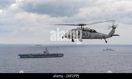 221114-N-PS962-1610 PHILIPPINE SEA (Nov. 14, 2022) An MH-60S Seahawk ...