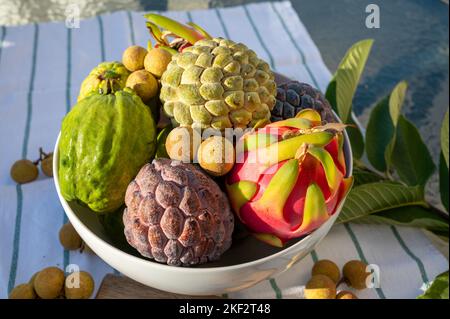 Variaty of tasty tropical exotic fruits, ripe fresh lychee, dragon ...