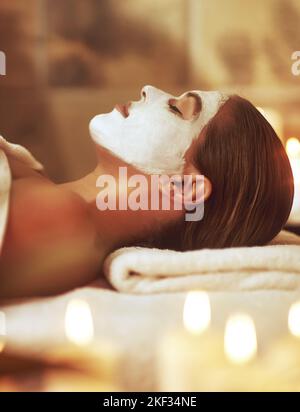 Just let your skin breathe. a young woman enjoying a facial treatment ...