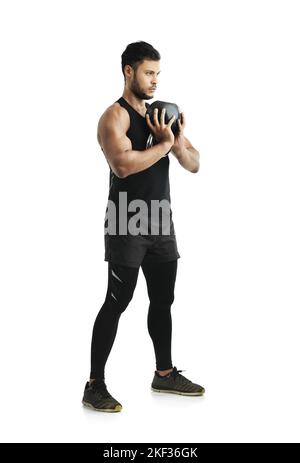 Staying fit is my lifestyle. a handsome young man standing alone ...