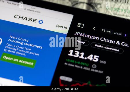 The logo of JPMorgan Chase & Co. is seen on the screen of a smartphone ...