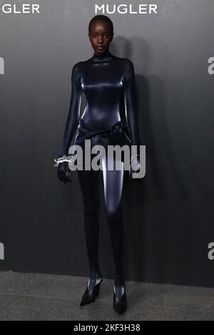 Akuol Deng walking the red carpet at the Mugler Couturissime Exhibition ...