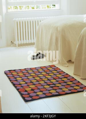 A recycled felt penny rug Stock Photo - Alamy