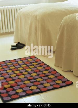 A recycled felt penny rug Stock Photo - Alamy