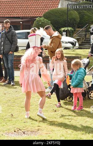 Majorettes Street Artists in Pink uniforms Stock Photo - Alamy
