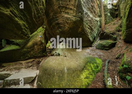 The romantic labyrinth of sandstone rocks lies above the left bank of ...
