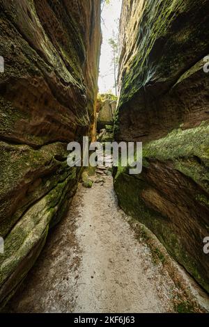 The romantic labyrinth of sandstone rocks lies above the left bank of ...