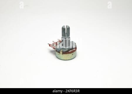 A variable resistor or potentiometer with code B10K stuck on a small ...
