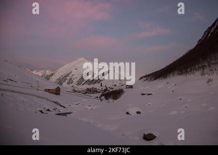 Svan towers durring sunset attached to residential houses in the ...