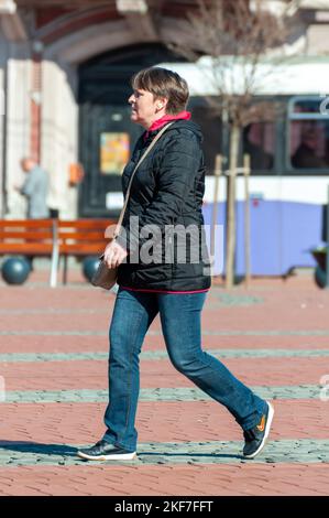 TIMISOARA, ROMANIA - MARCH 15, 2018: Business man walking on the street ...