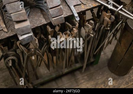 blacksmith tools and metal blanks in privet forge Stock Photo - Alamy