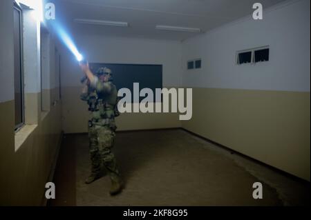 U.S. Army Operational Detachment-Alpha (ODA) members move towards their ...