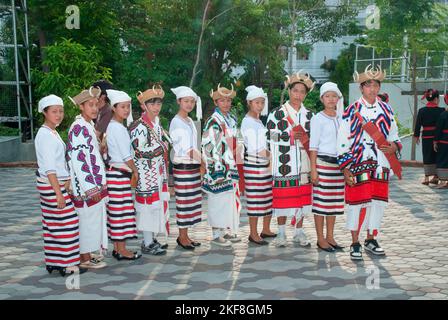 Ethnic Kachin male in traditional attire wear traditional rattan hats ...