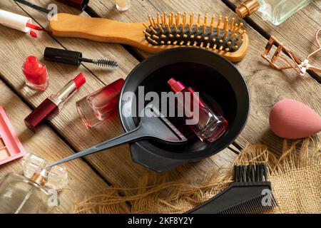 Hair brush and cosmetics on wooden background Stock Photo - Alamy