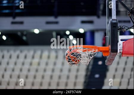 Basket ball entering the net in a basketball court Stock Photo - Alamy
