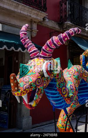 Mexican papier mache statue in the historical downtown of Oaxaca Mexico ...