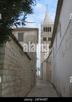 The narrow, winding streets in Rab are part of the charm of this ...
