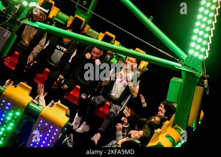 People Enjoying Fast Spinning Amusement Rides at The Royal Melbourne ...