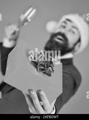 Businessman with happy face holds present box in close up Stock Photo ...