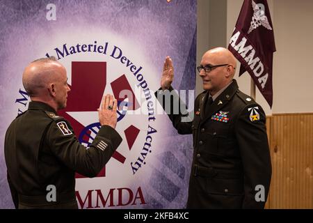 Col. Andy Nuce administers the Oath of Office to newly promoted Lt. Col ...