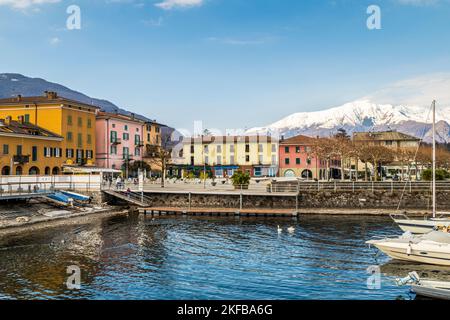 Colico, Italy - 03-02-2021: The main square of Colico with its colorful ...