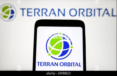 In this photo illustration, Terran Orbital logo is seen on a smartphone ...