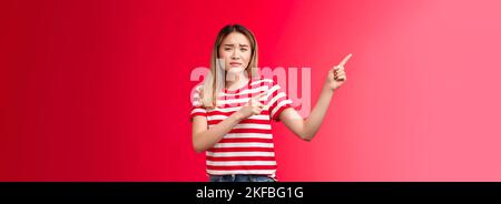 Whining displeased blond asian disappointed girl frowning hesitant ...